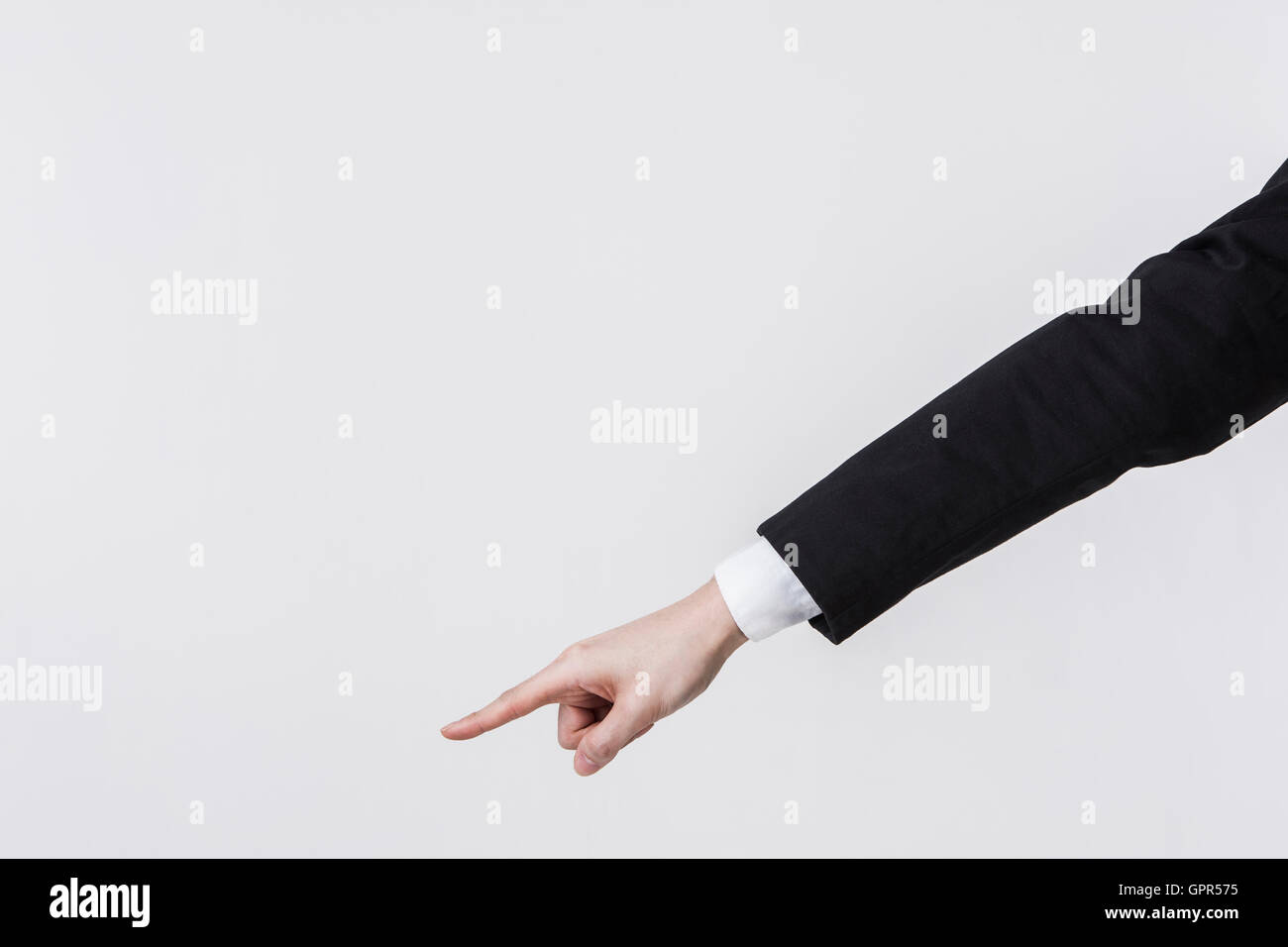 Hand pointing down Stock Photo - Alamy