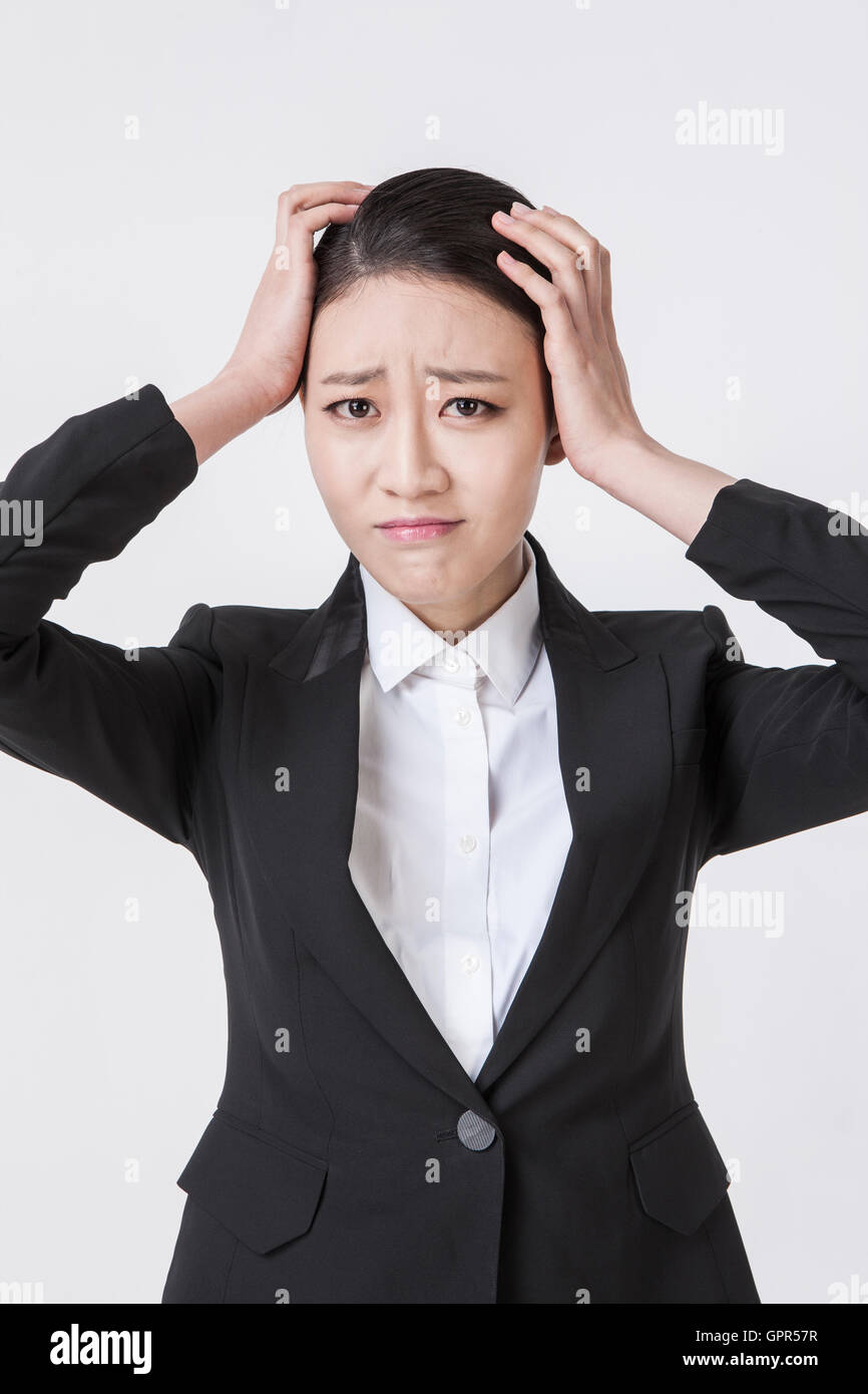 Young stressful businesswoman Stock Photo - Alamy