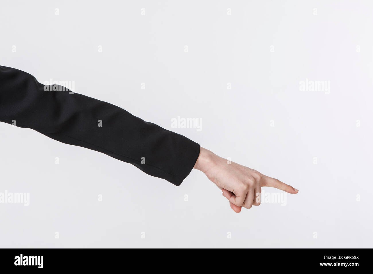 Hand pointing down Stock Photo - Alamy