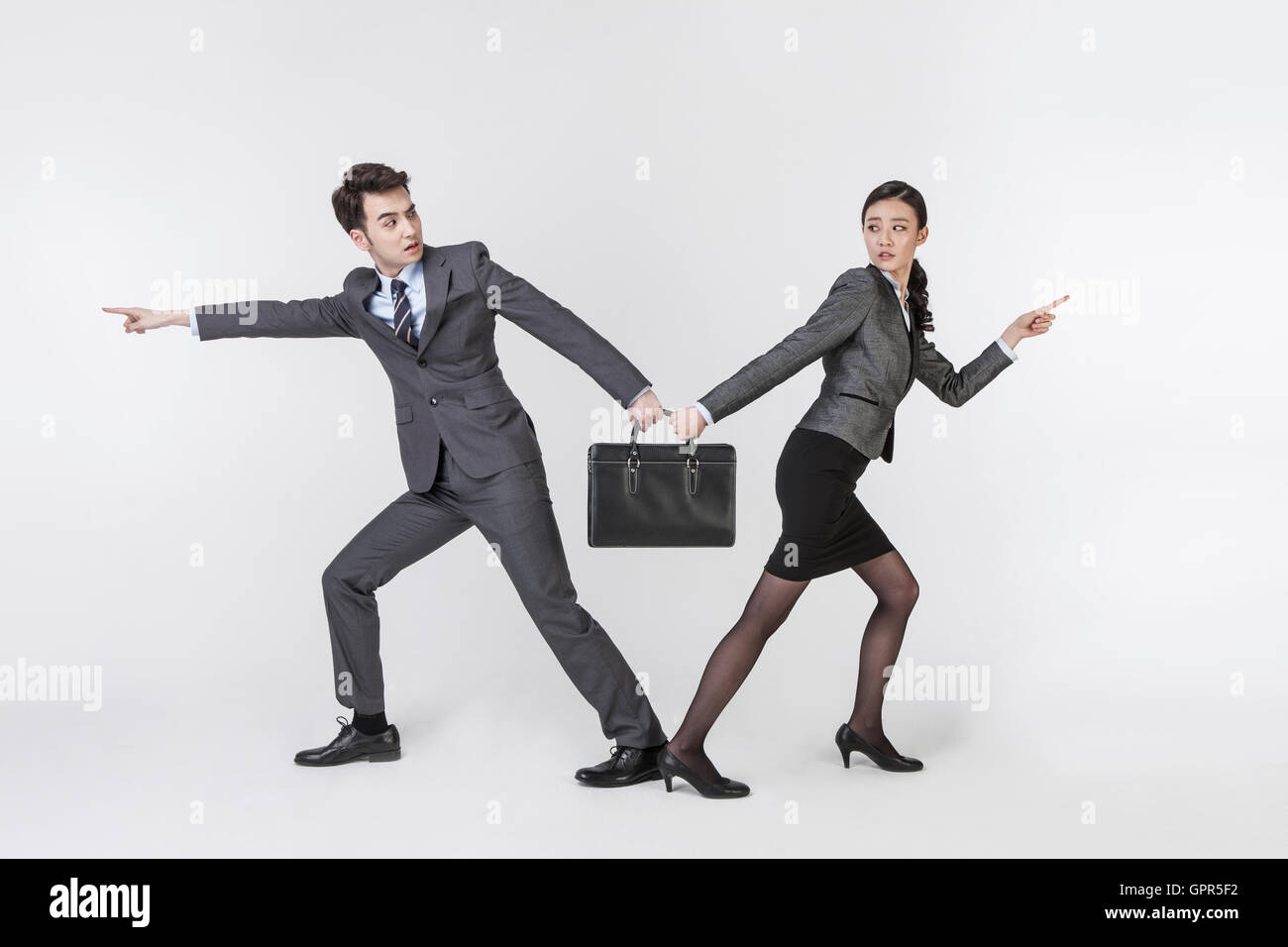 Lifestyle of business rivals Stock Photo - Alamy