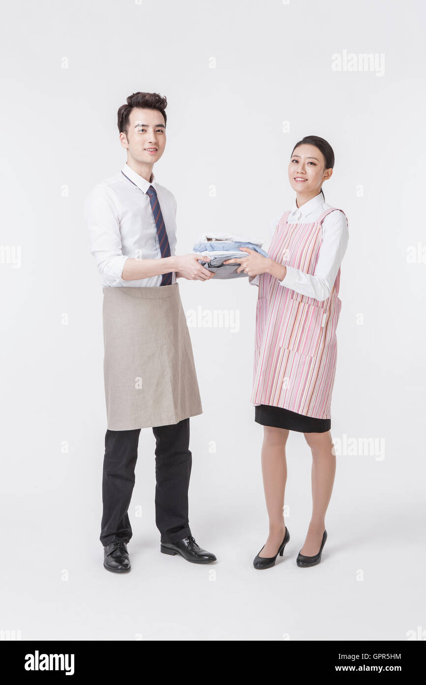 Loving harmonious young couple doing chores Stock Photo - Alamy