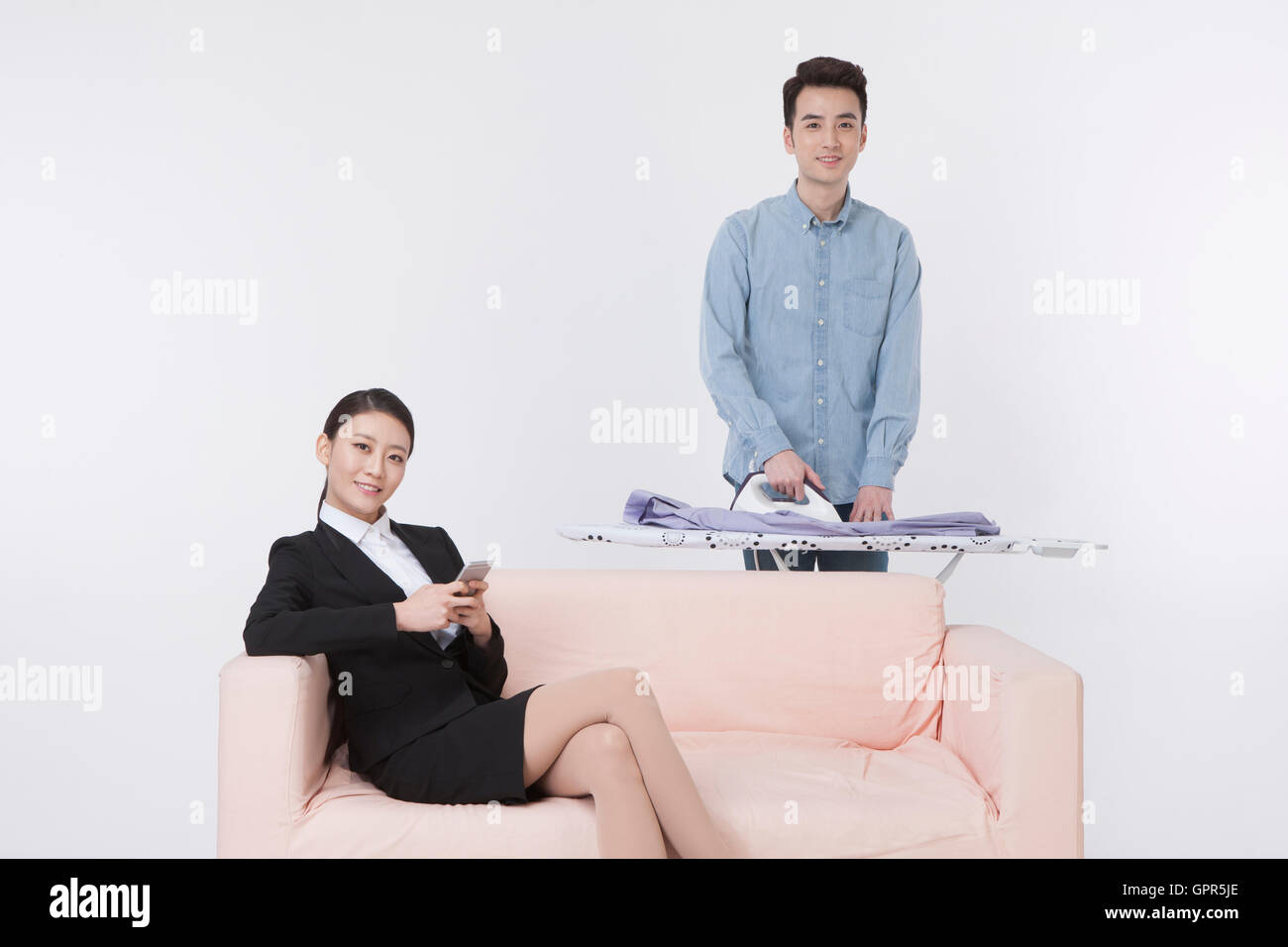 Role reversal couple hi-res stock photography and images - Alamy