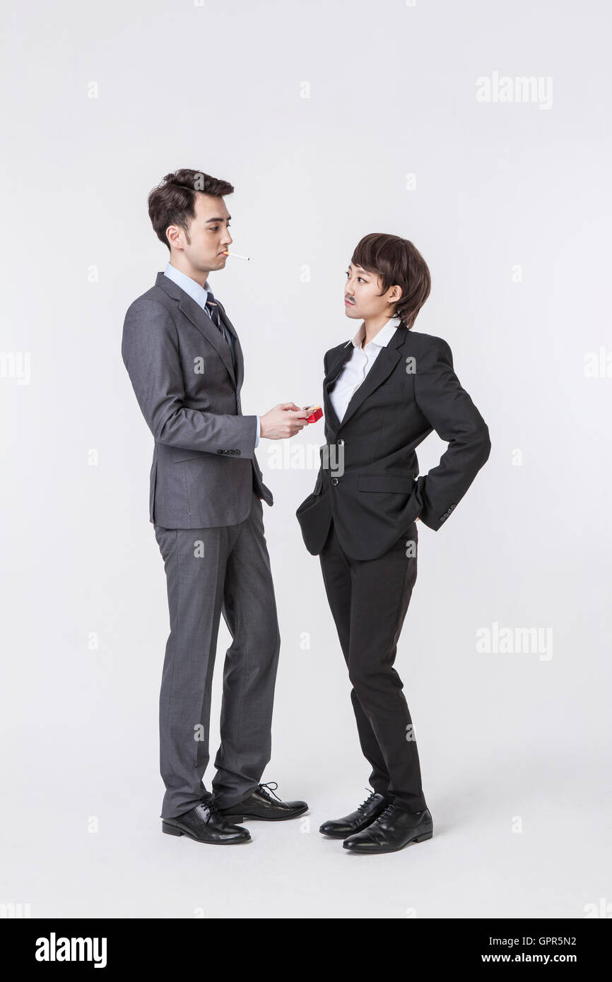 Business people with cigarette case Stock Photo - Alamy