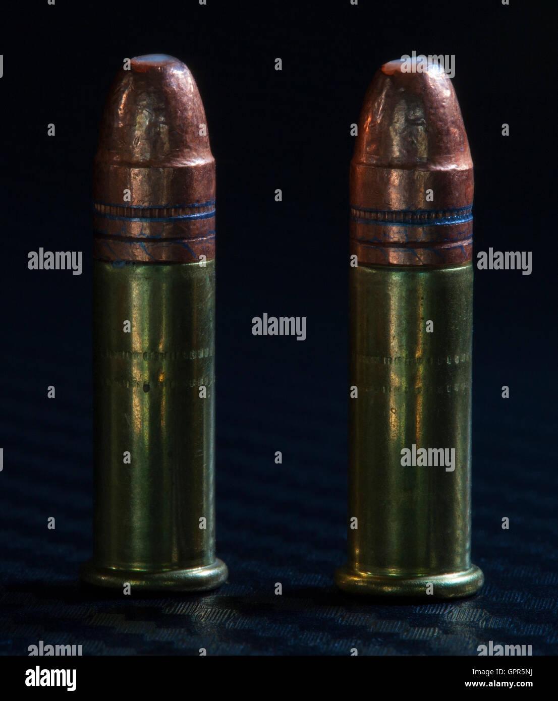 Two cartridges that are designed for firearms that are twenty two ...