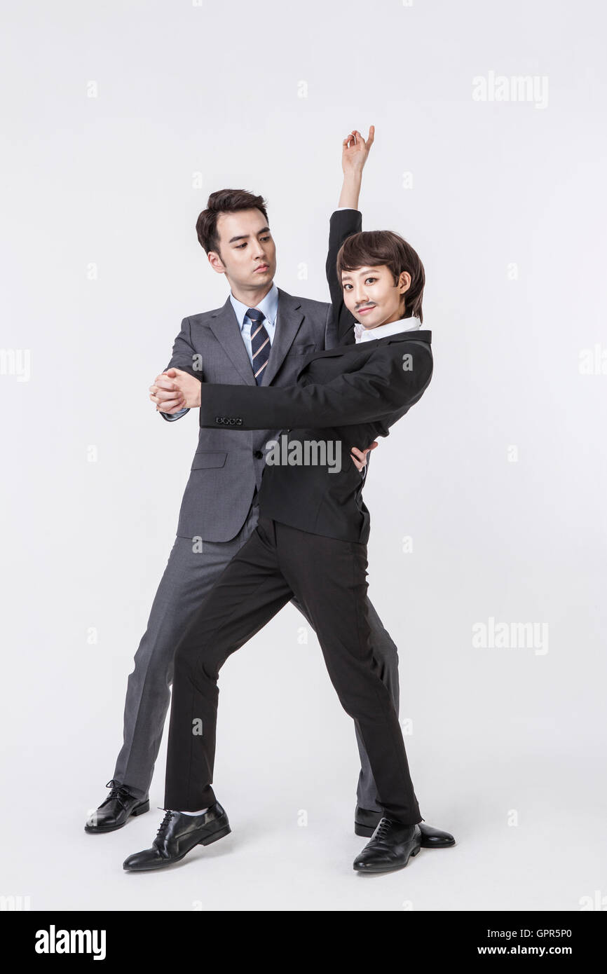 Business people dancing Stock Photo - Alamy
