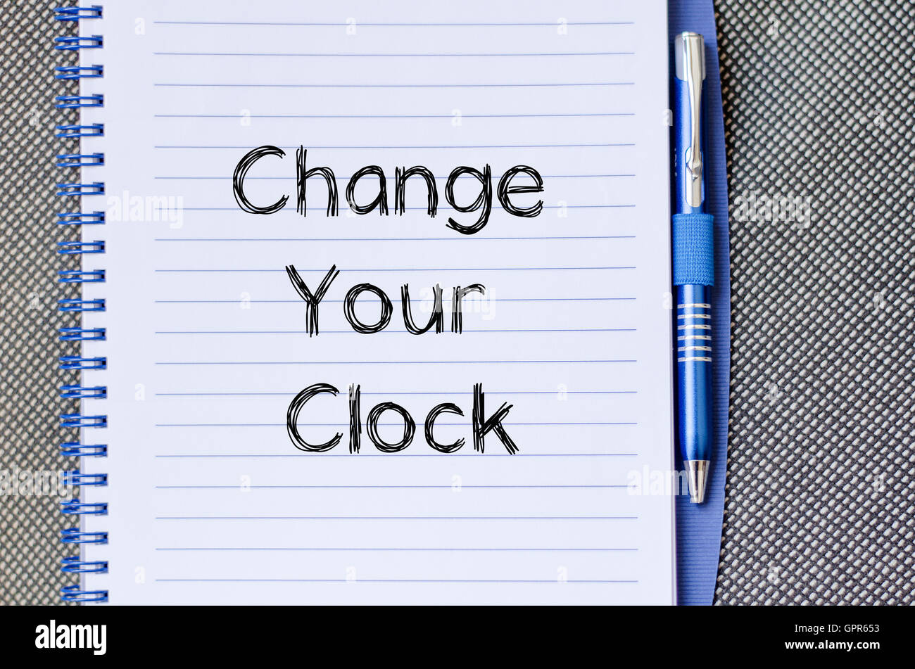 Change your clock text concept write on notebook Stock Photo - Alamy