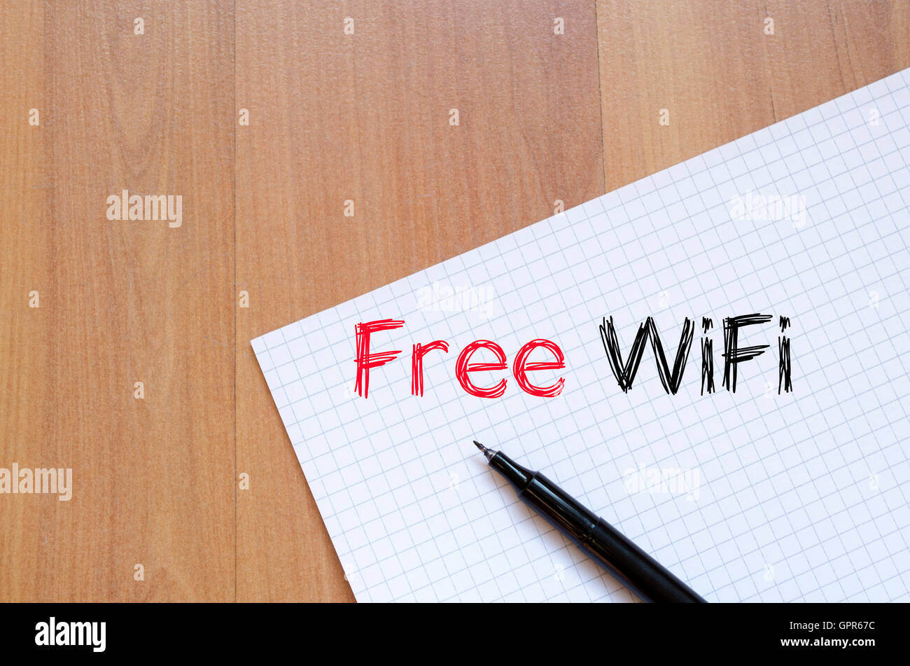Free wifi text concept write on notebook Stock Photo - Alamy