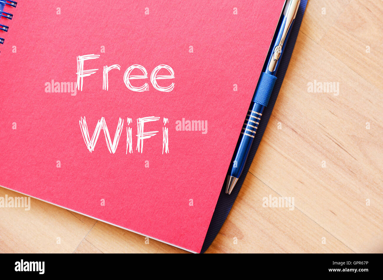 Free wifi text concept write on notebook Stock Photo - Alamy
