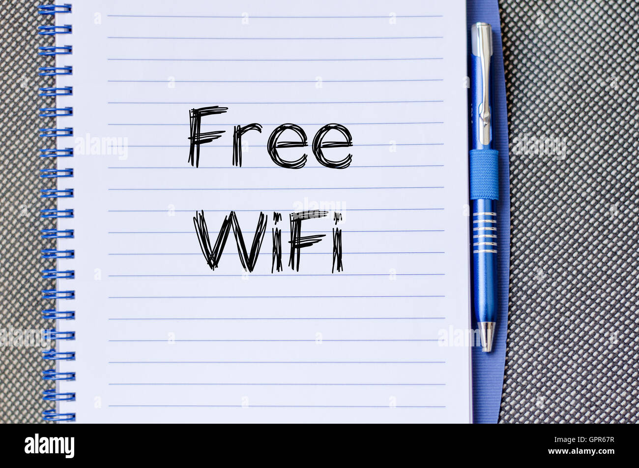 Free wifi text concept write on notebook Stock Photo - Alamy