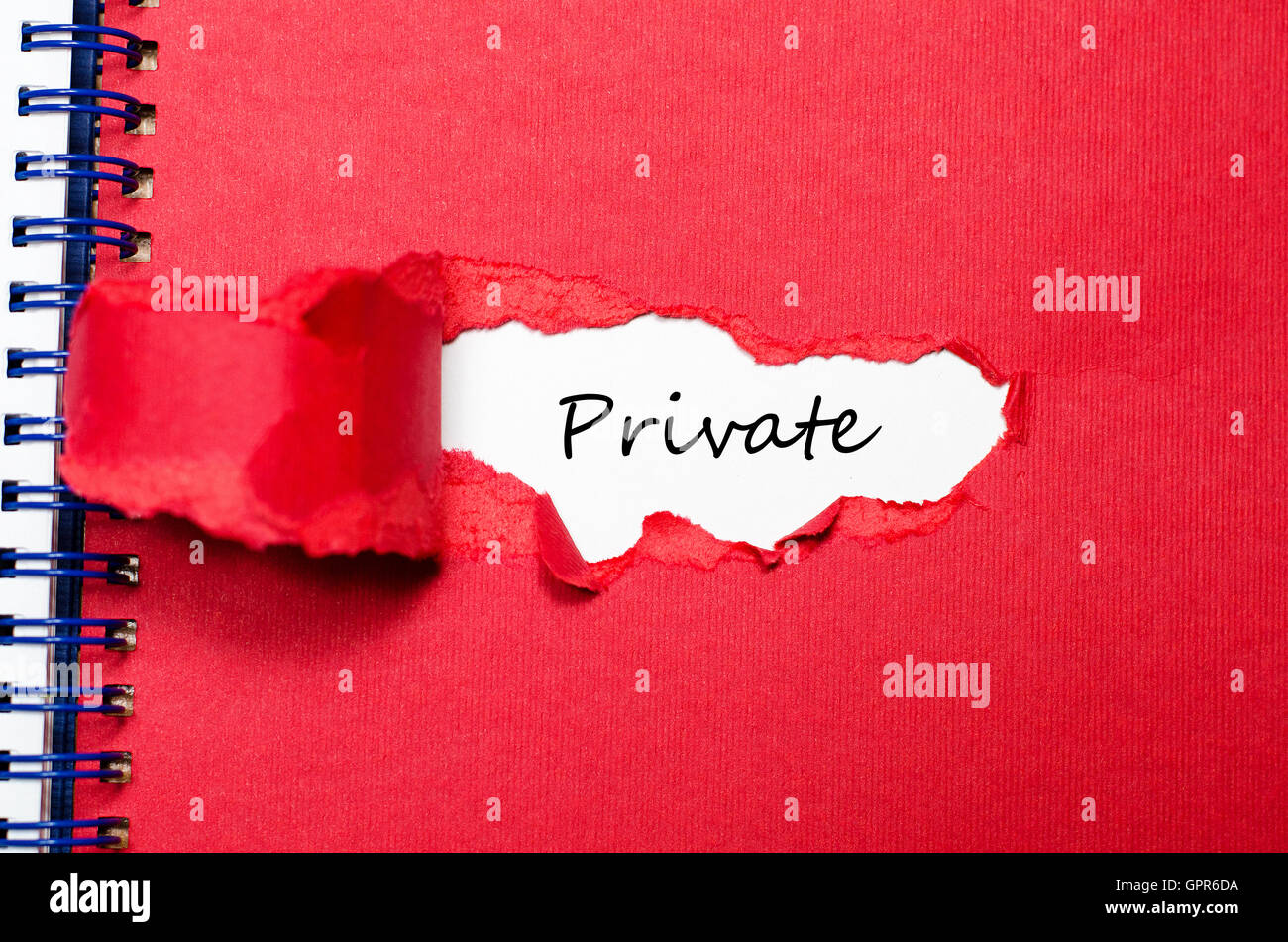 The word private appearing behind torn paper Stock Photo - Alamy