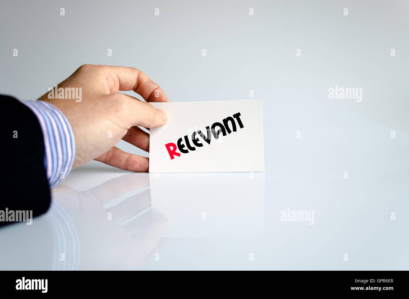 Relevant text concept isolated over white background Stock Photo - Alamy