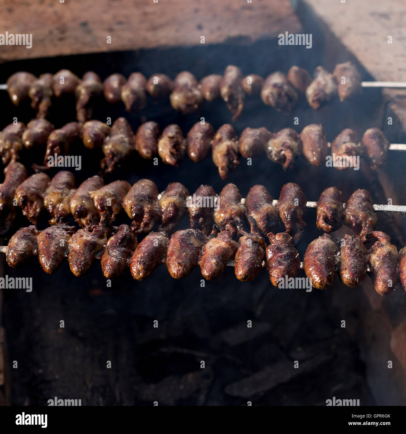 Churrasco, traditional Brazilian barbecue, chicken hearts grilled ...