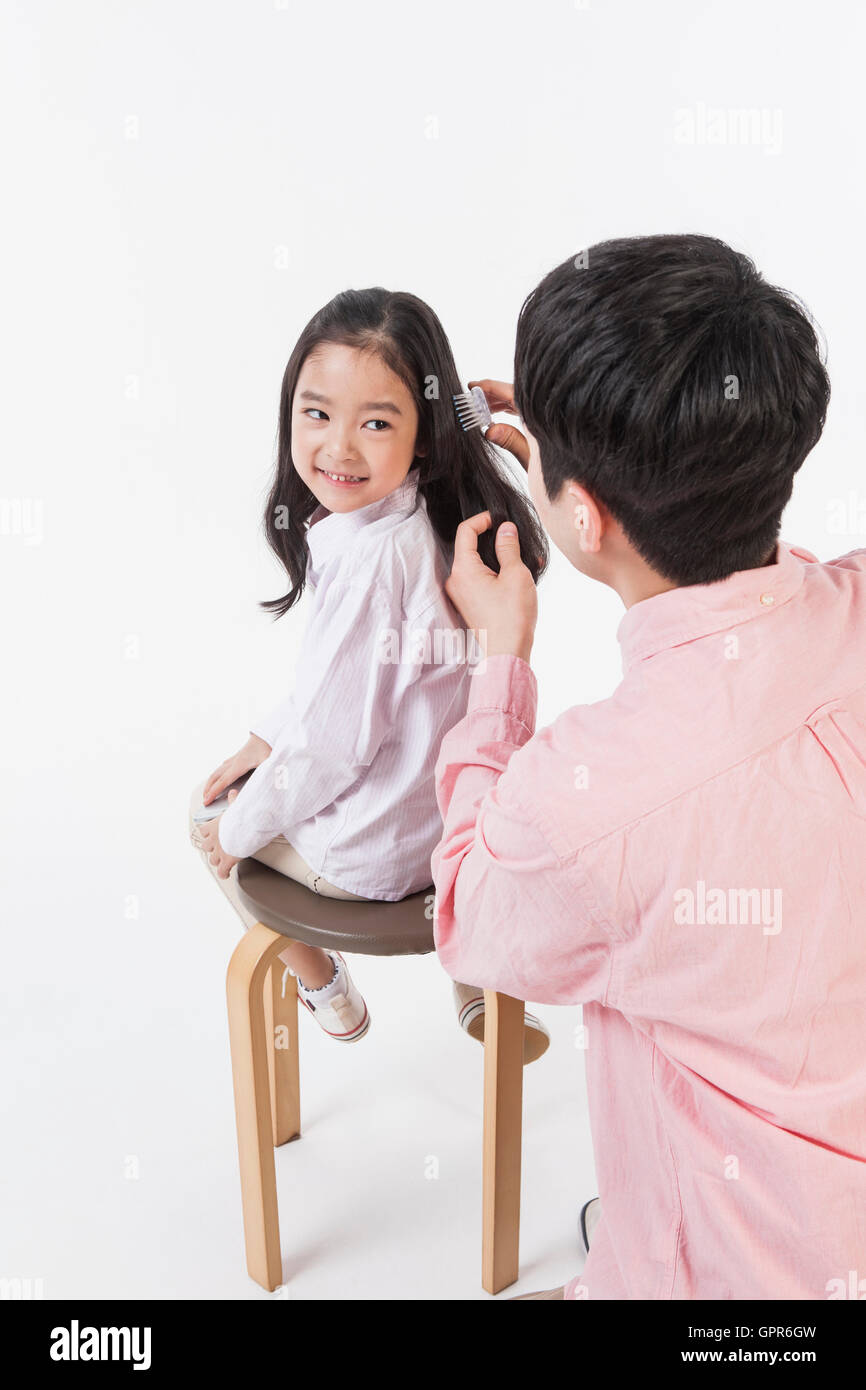 Loving father taking care of daughter Stock Photo - Alamy