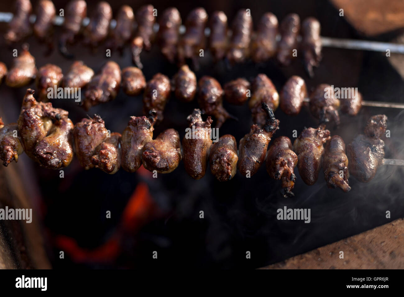 Churrasco, traditional Brazilian barbecue, chicken hearts grilled ...