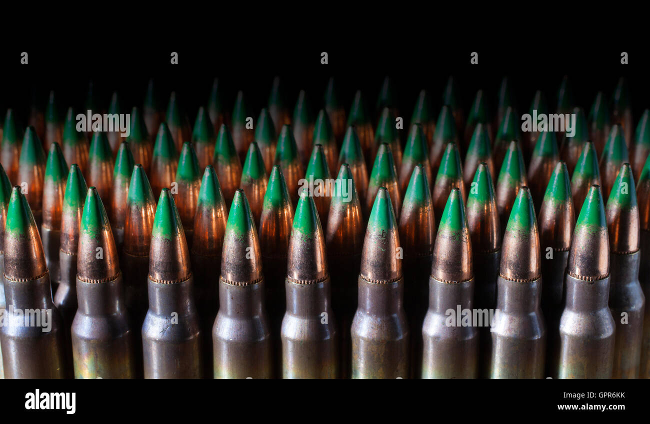 Bullets with green tips atop a lot of rifle cartridges Stock Photo - Alamy