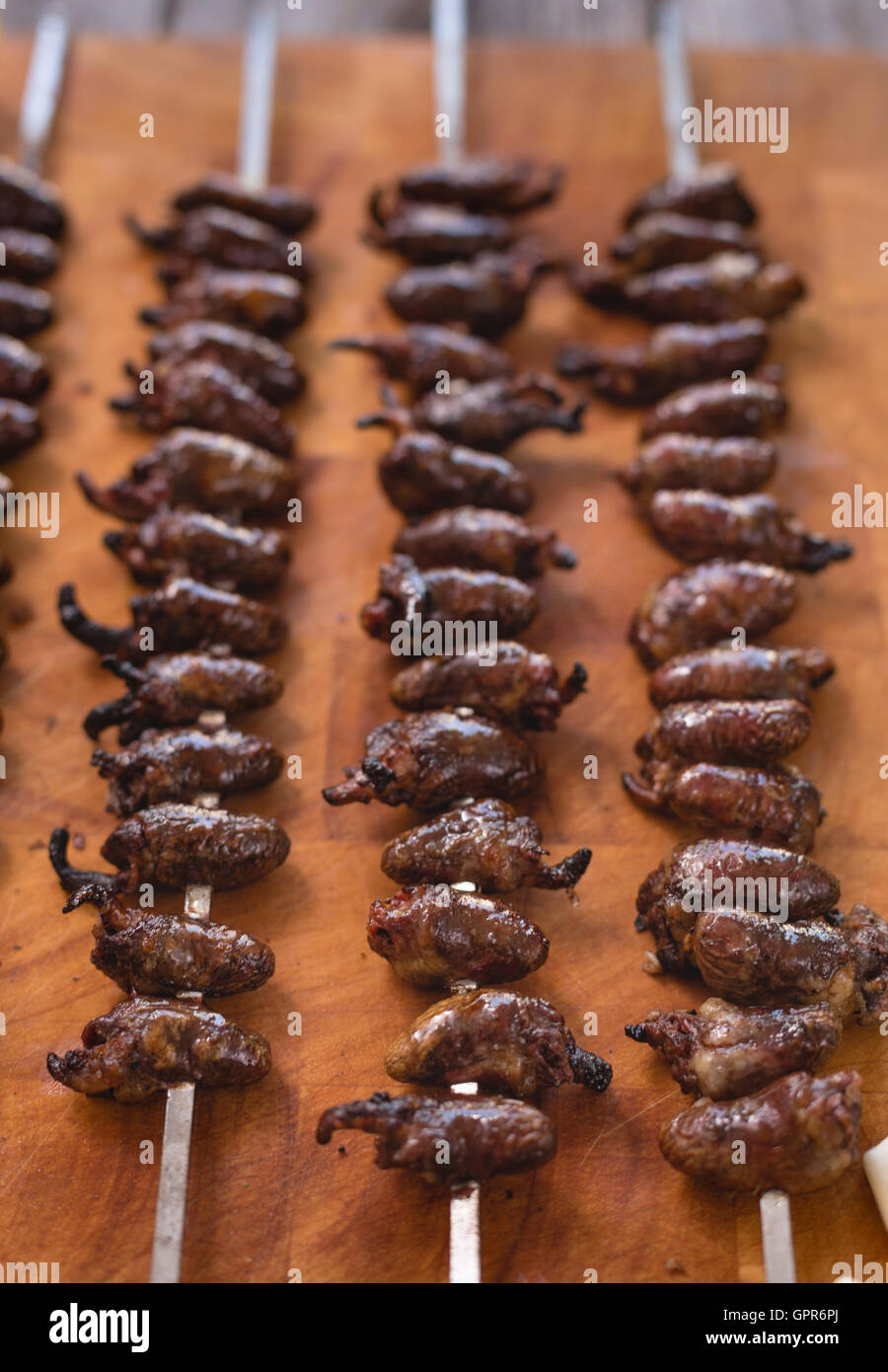 Churrasco, traditional Brazilian barbecue, chicken hearts grilled ...