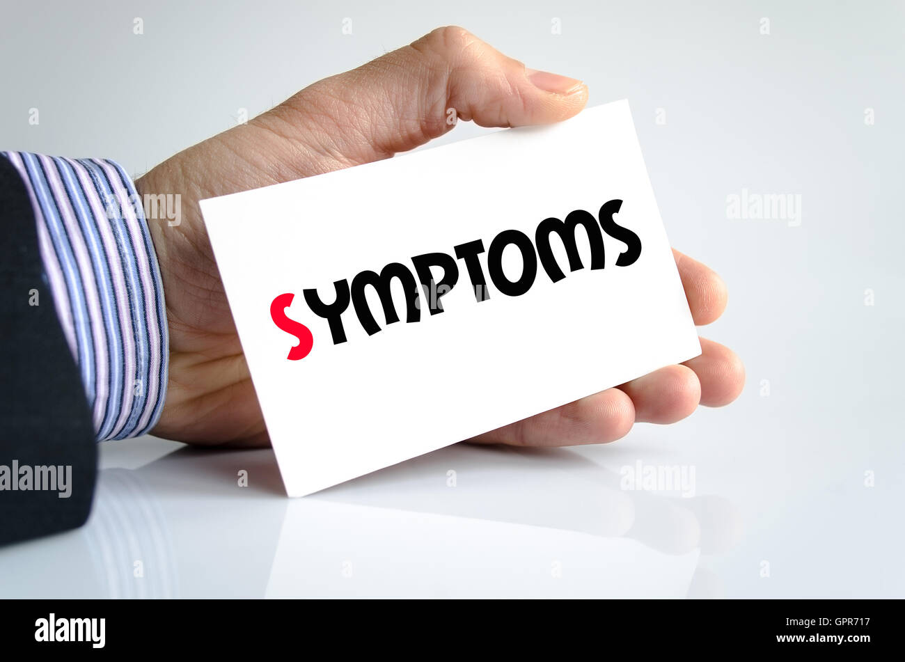 Symptoms text concept isolated over white background Stock Photo - Alamy