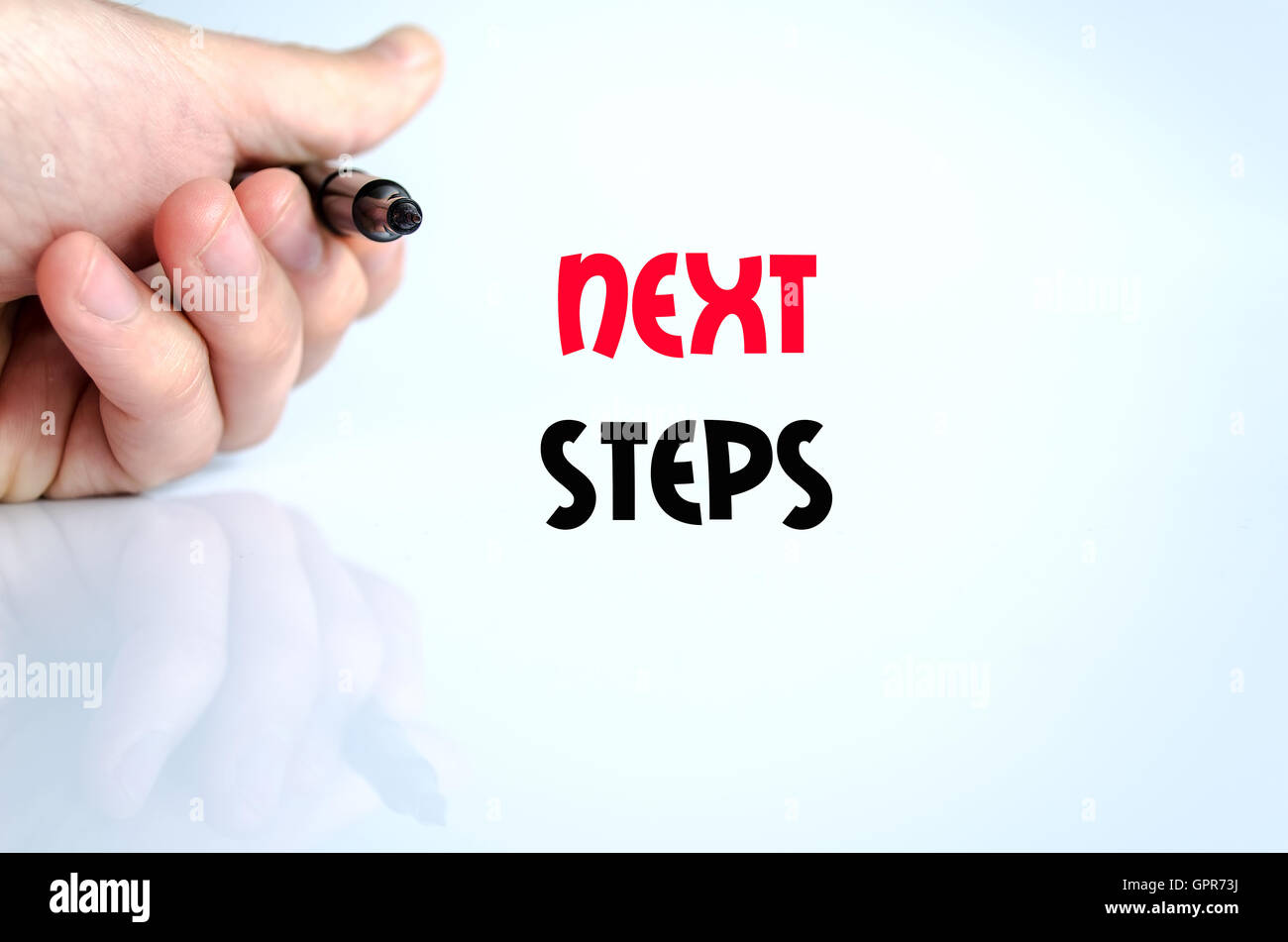 Next steps text concept isolated over white background Stock Photo - Alamy