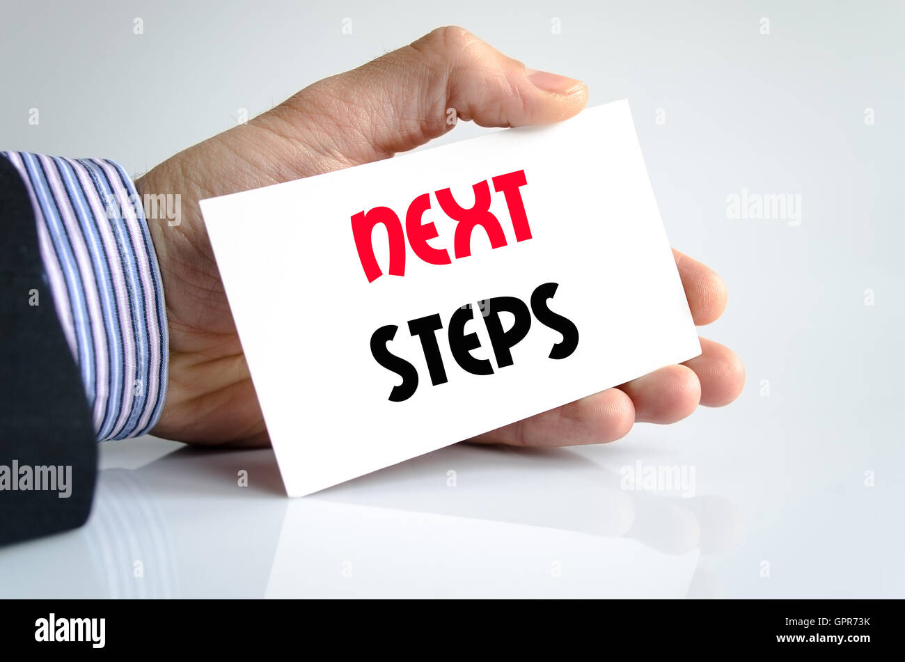 Next steps text concept isolated over white background Stock Photo - Alamy