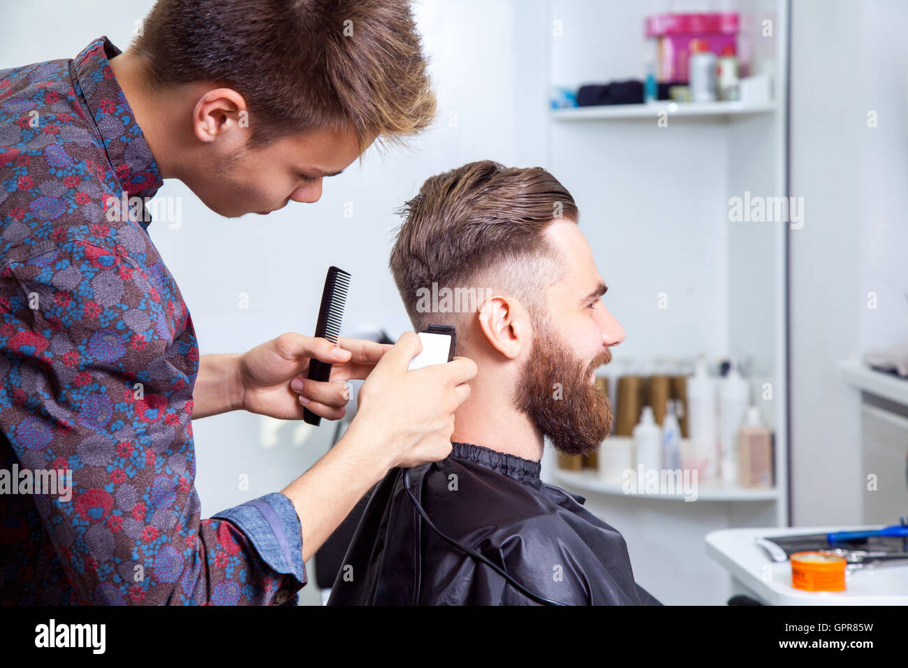 Serious man barber razor hi-res stock photography and images - Alamy