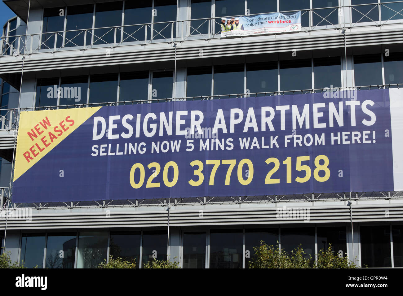 banner advert for designer apartments, on a property development by ...