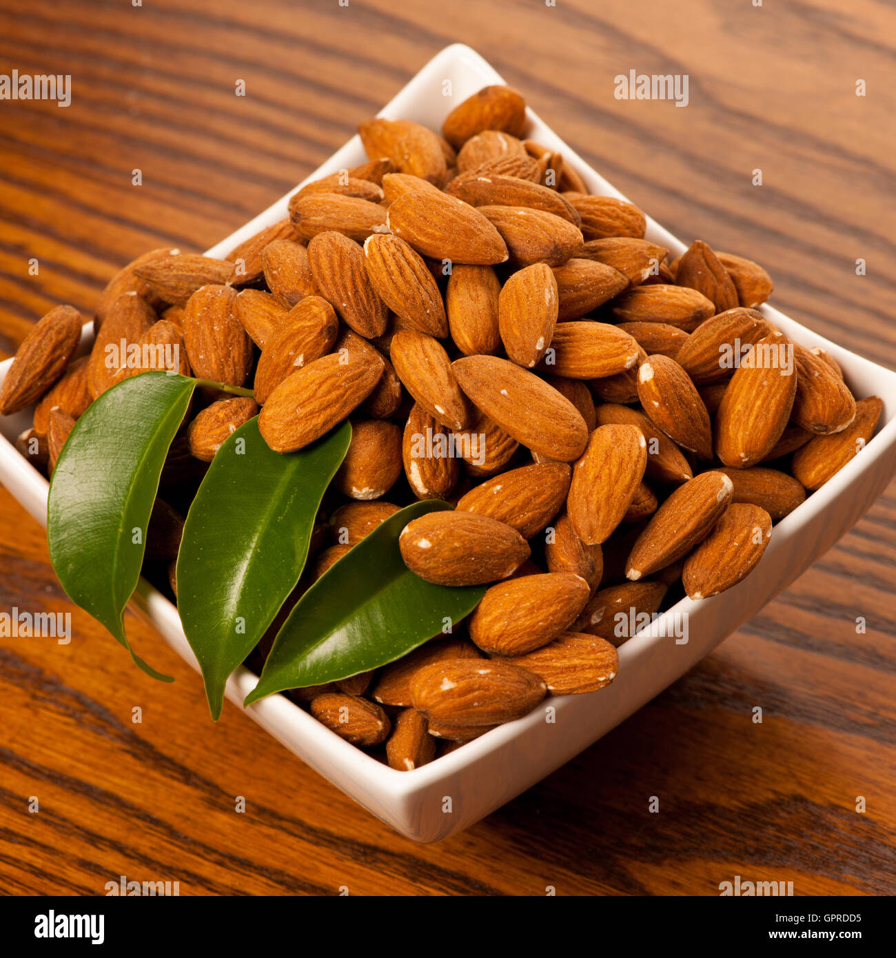 Almonds nuts snack bowl hi-res stock photography and images - Alamy