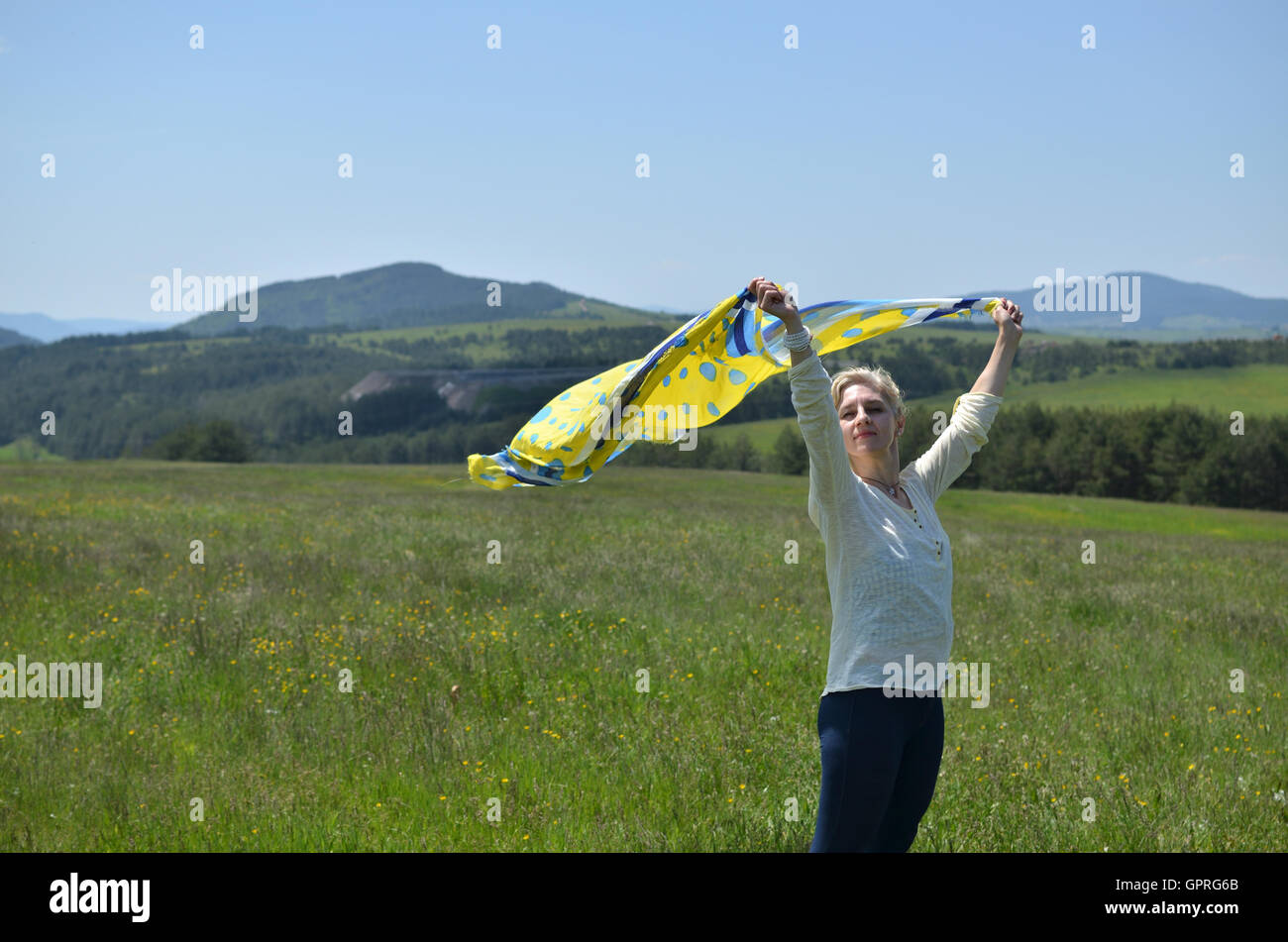 Scarf blowing in wind hi-res stock photography and images - Alamy