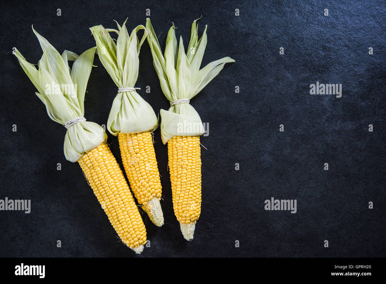 whole corn cob,autumn harvest vegetable Stock Photo - Alamy