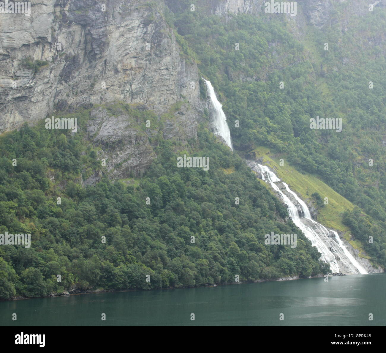 Waterfall in the Norwegian fjords Stock Photo - Alamy