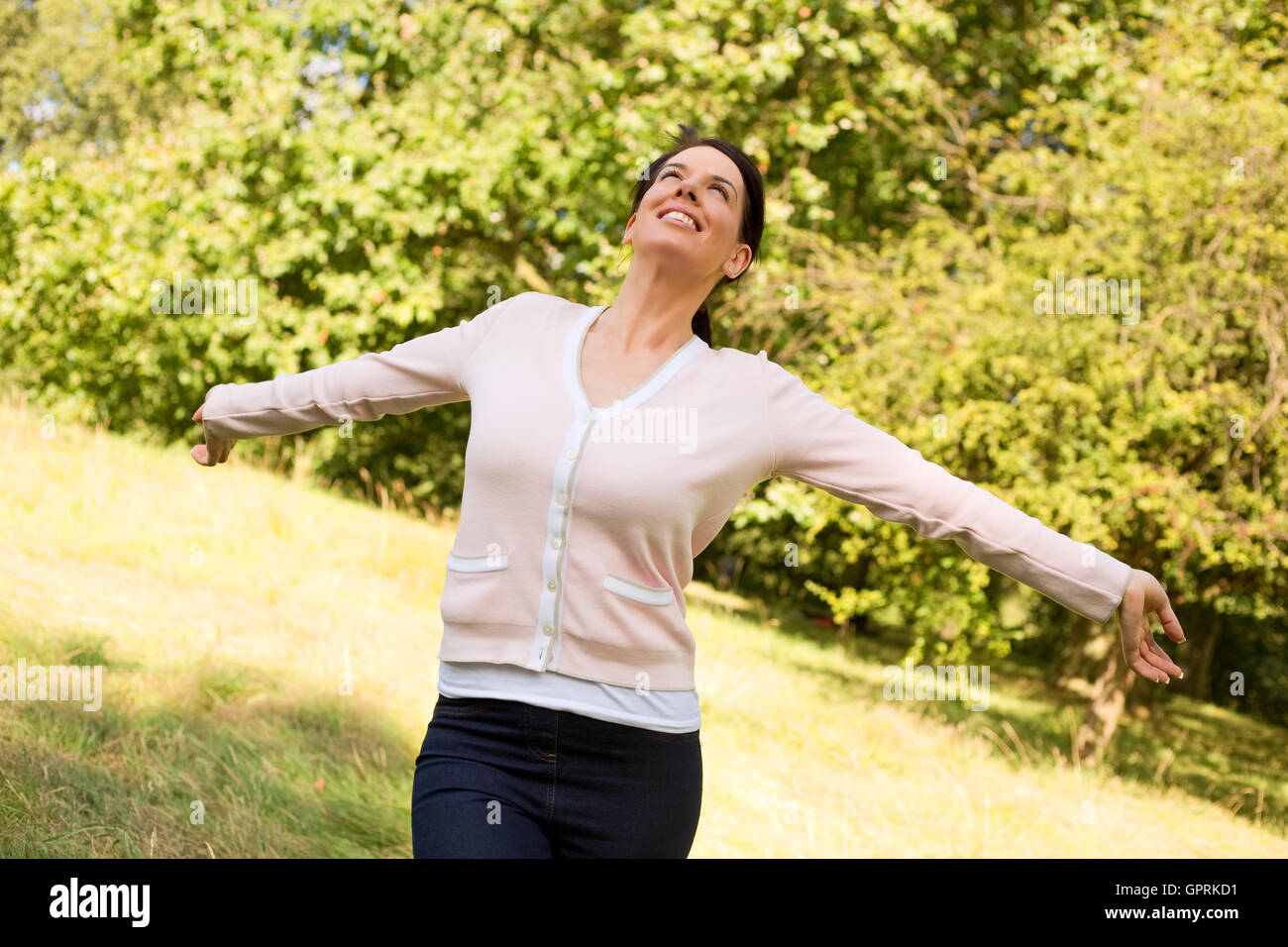 young woman enjoying the fresh air Stock Photo - Alamy
