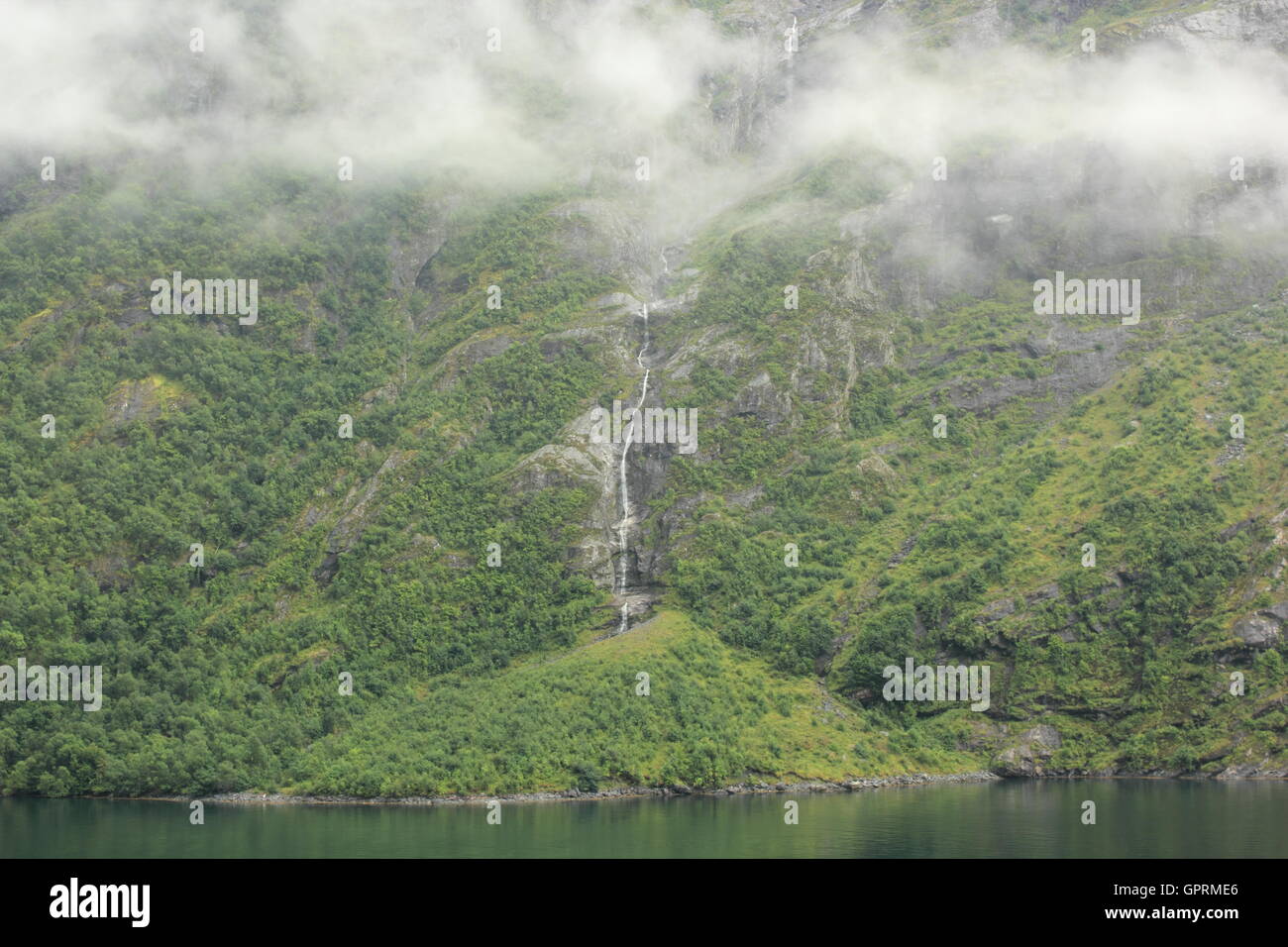 Waterfall in the Norwegian fjords Stock Photo - Alamy