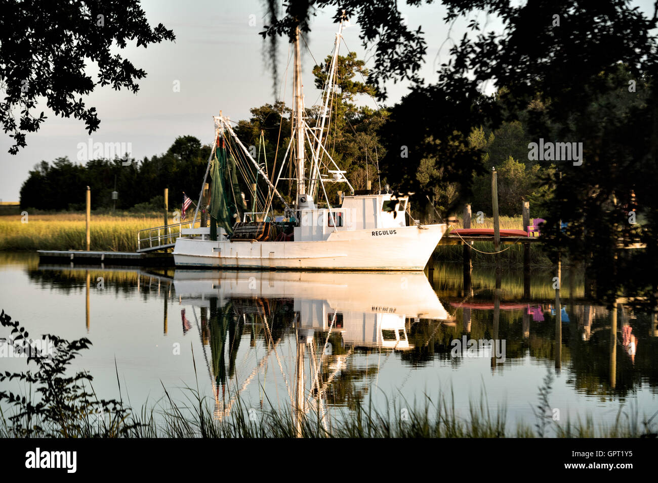 Shrimp boats along Jeremy Creek in the village of McClellanville, South ...