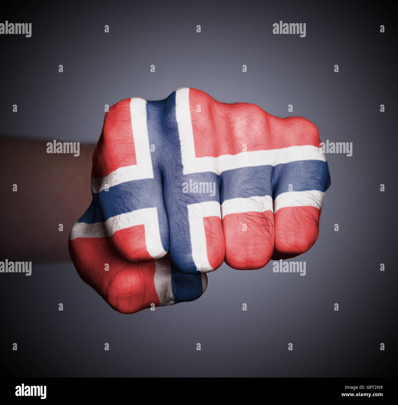 Front view of punching fist on gray background Stock Photo - Alamy