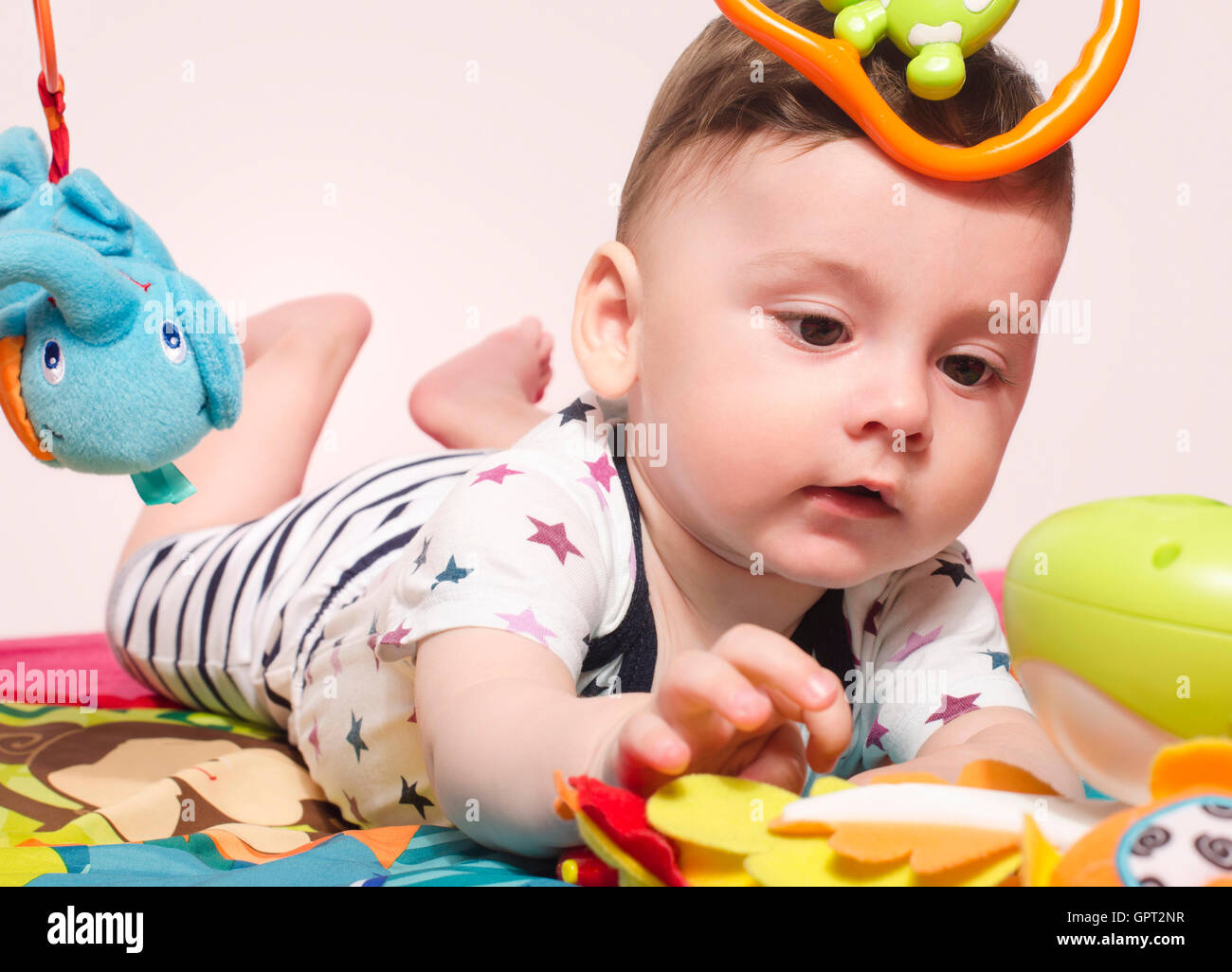 Baby crawling reaching hi-res stock photography and images - Alamy