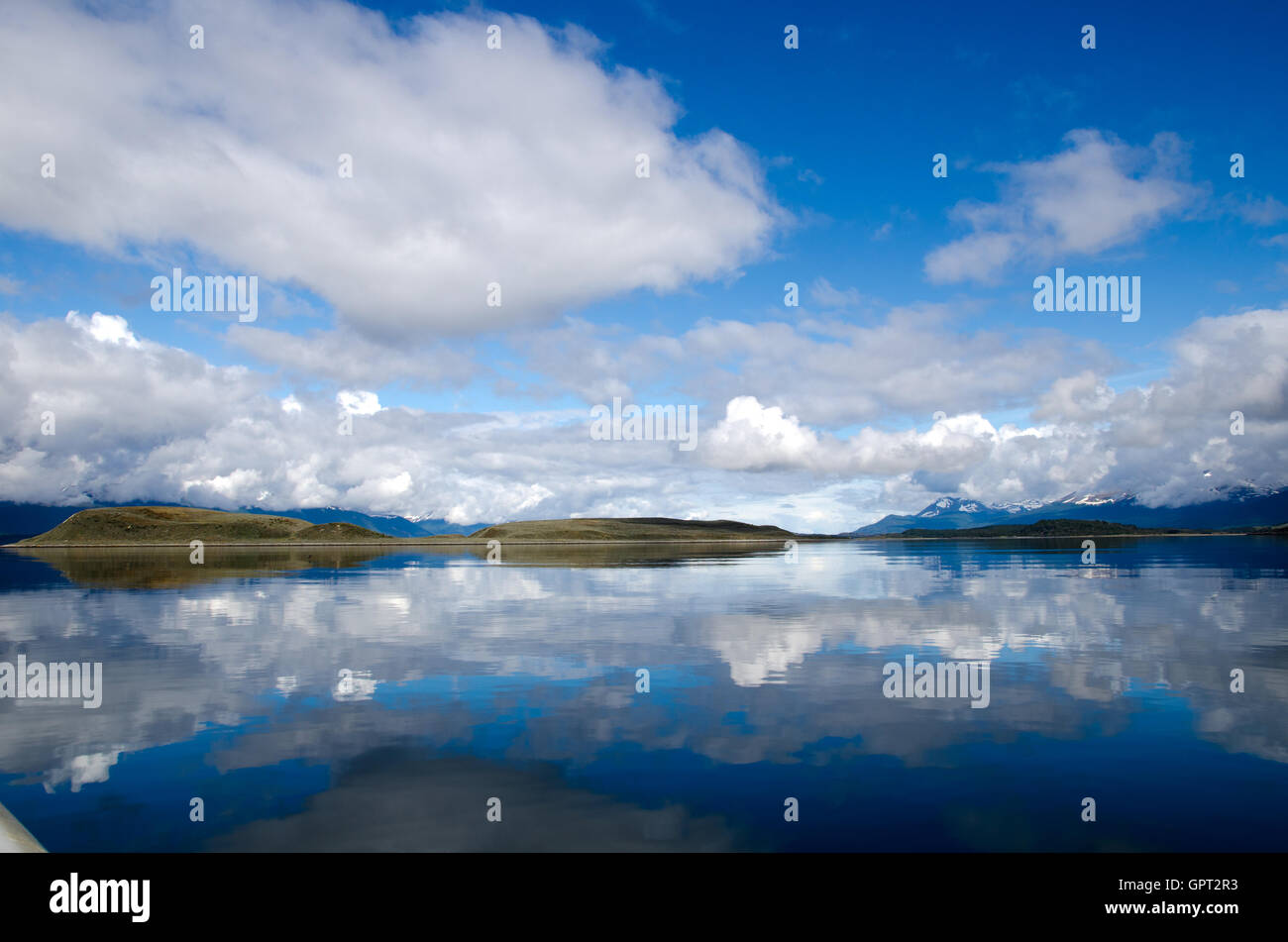 Dramatic sky and reflection on the Beagle Channel, Patagonia, Ar Stock ...