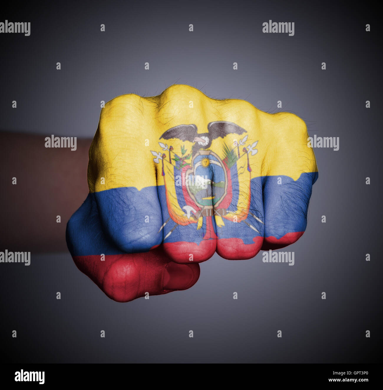 Front view of punching fist on gray background Stock Photo - Alamy