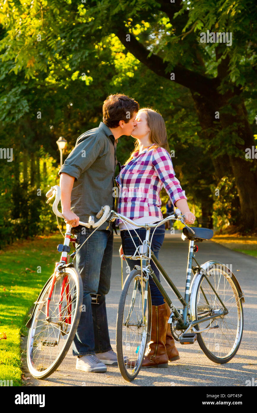 Couple with Bikes Stock Photo - Alamy