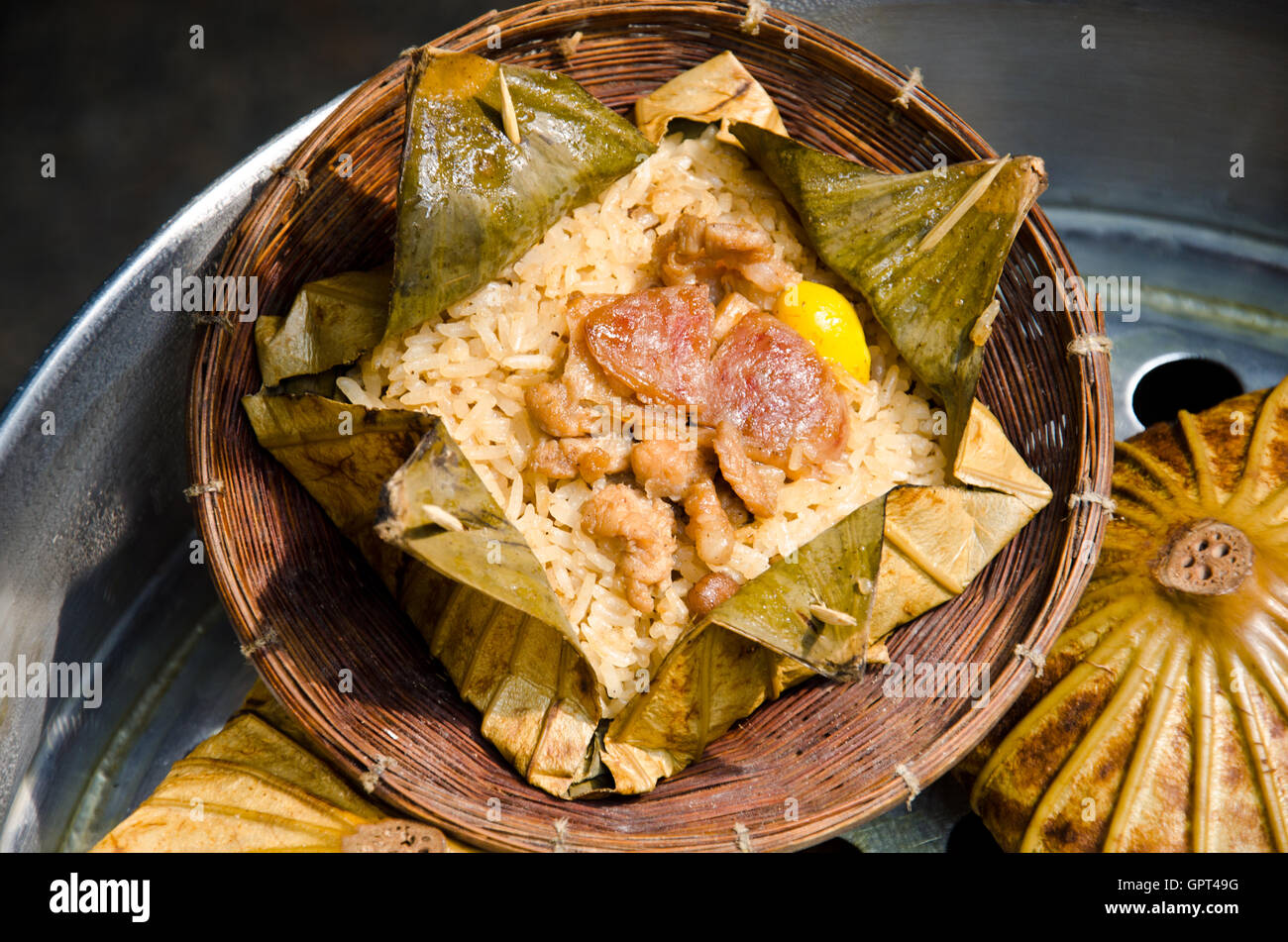Rice wrapped in lotus leaf Stock Photo - Alamy