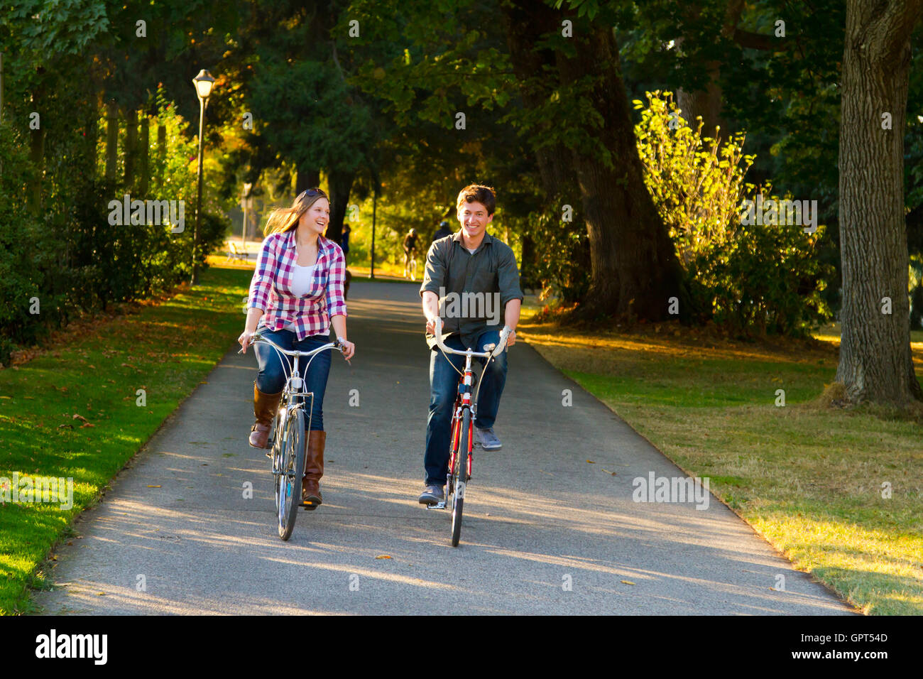 Couple with Bikes Stock Photo - Alamy