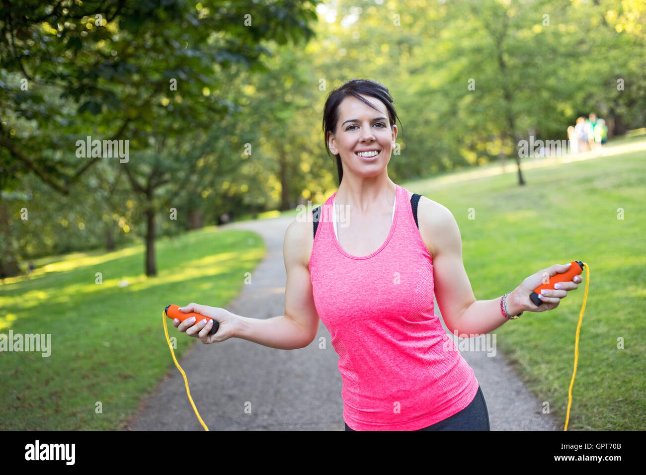 Woman skipping rope hi-res stock photography and images - Alamy