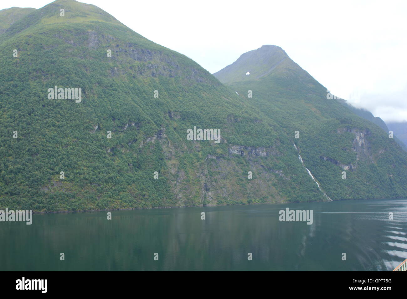 Waterfall in a Norwegian Fjord Stock Photo - Alamy