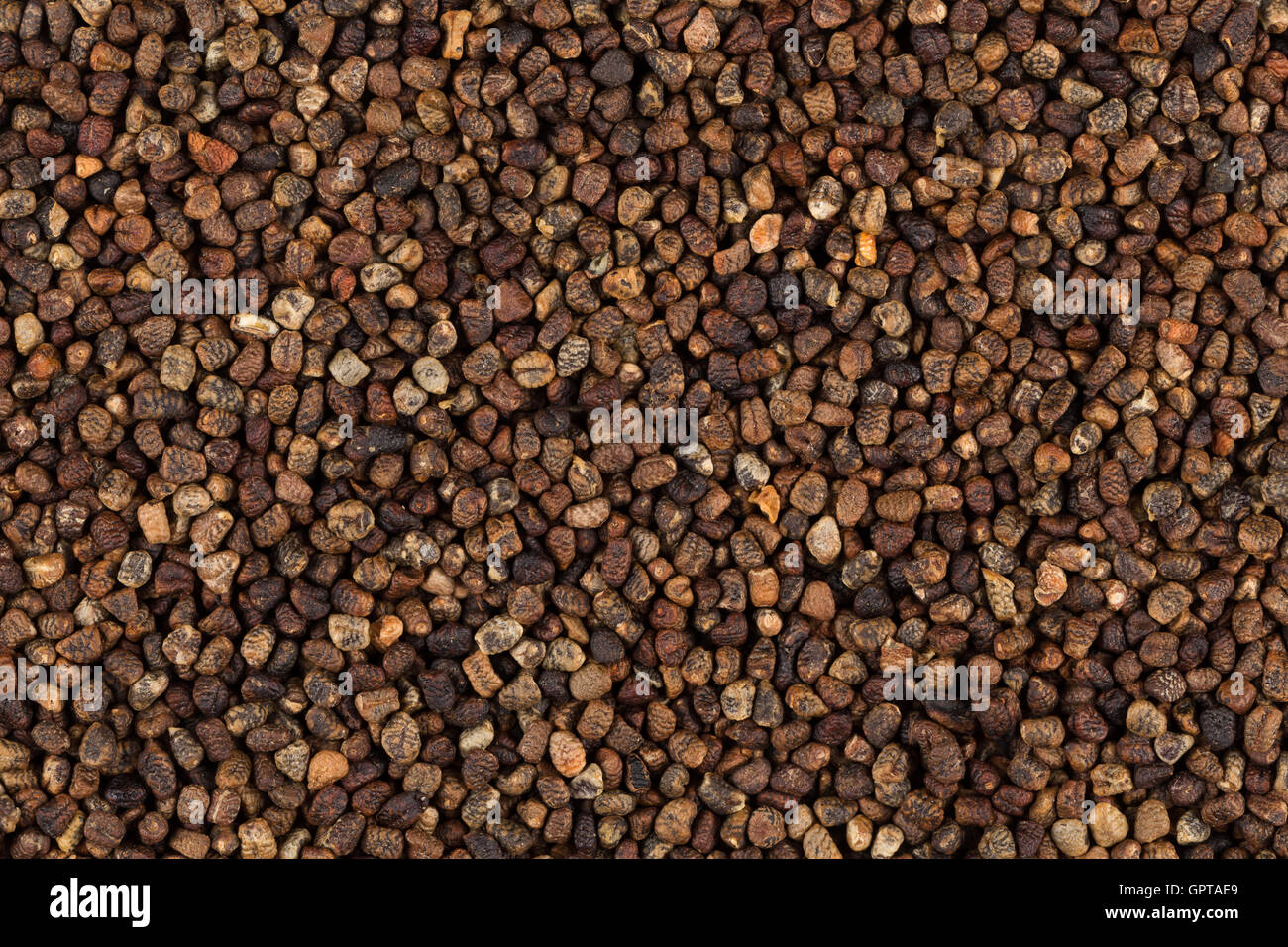 Decorticated cardamom seeds close up image can be used for background ...