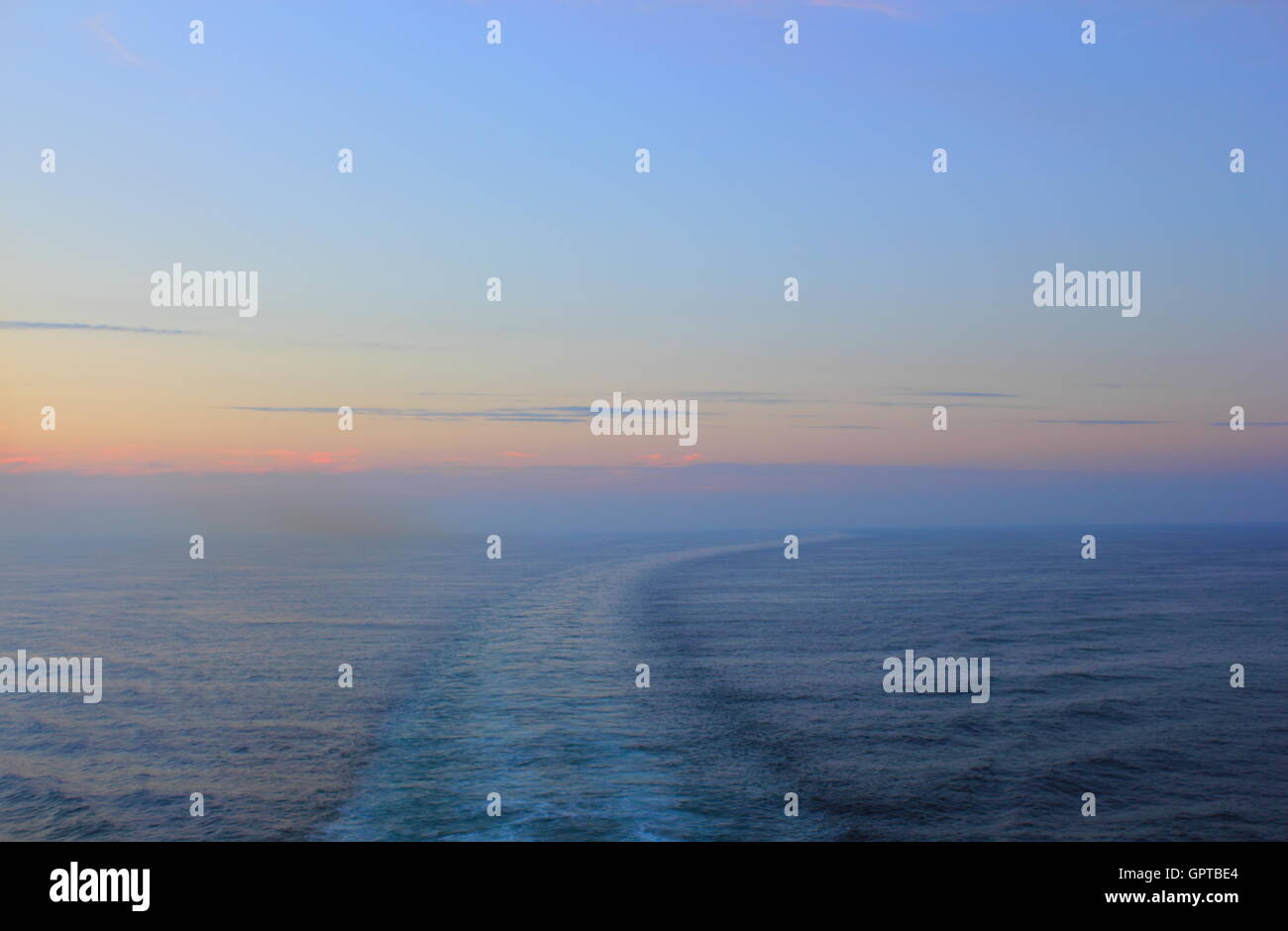 Trail of a cruise ship left behind in the ocean Stock Photo - Alamy