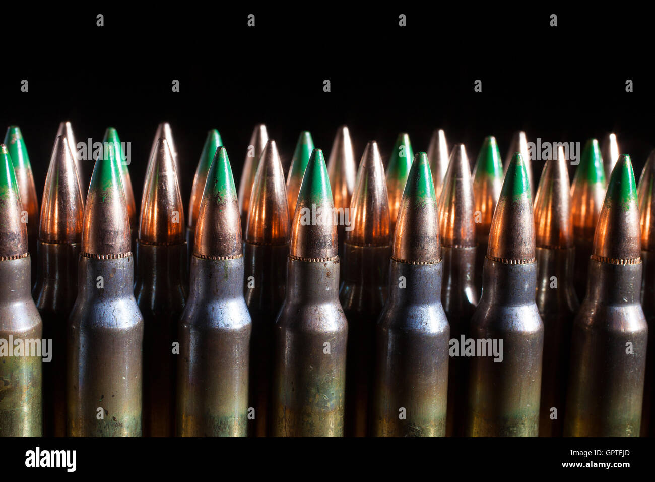 Cartridges that have bullets that are painted green on the tip Stock ...