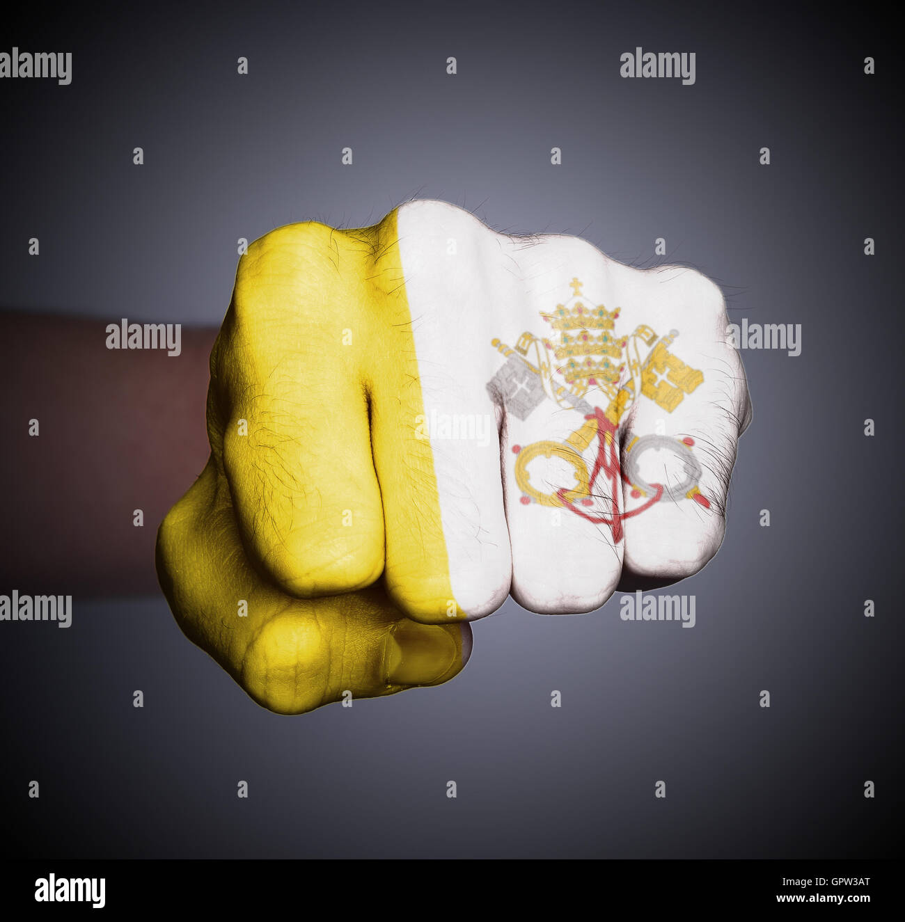 Front view of punching fist on gray background Stock Photo - Alamy
