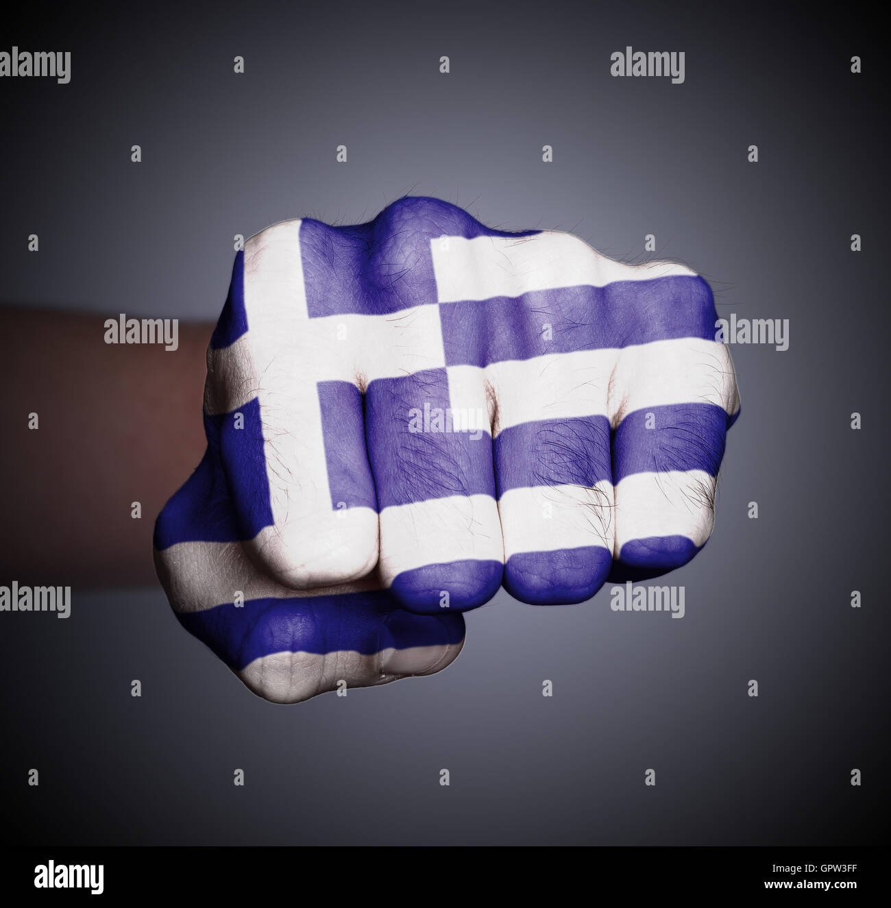 Front view of punching fist on gray background Stock Photo - Alamy