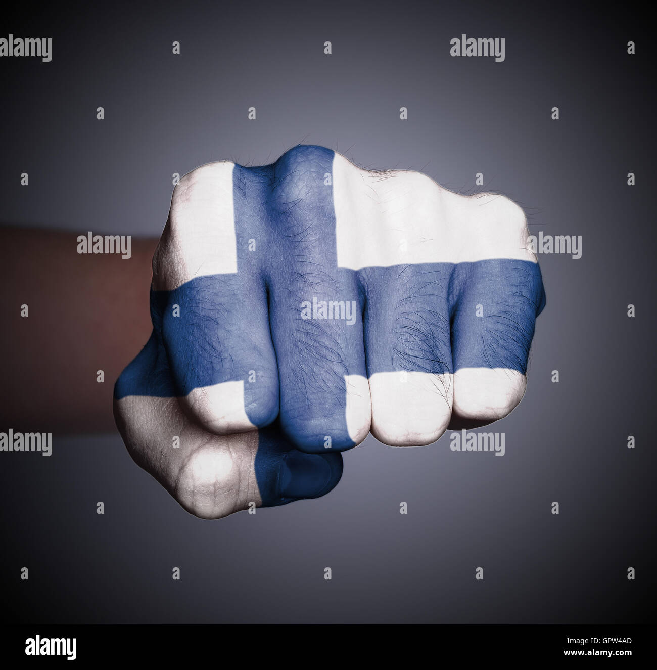 Front view of punching fist on gray background Stock Photo - Alamy