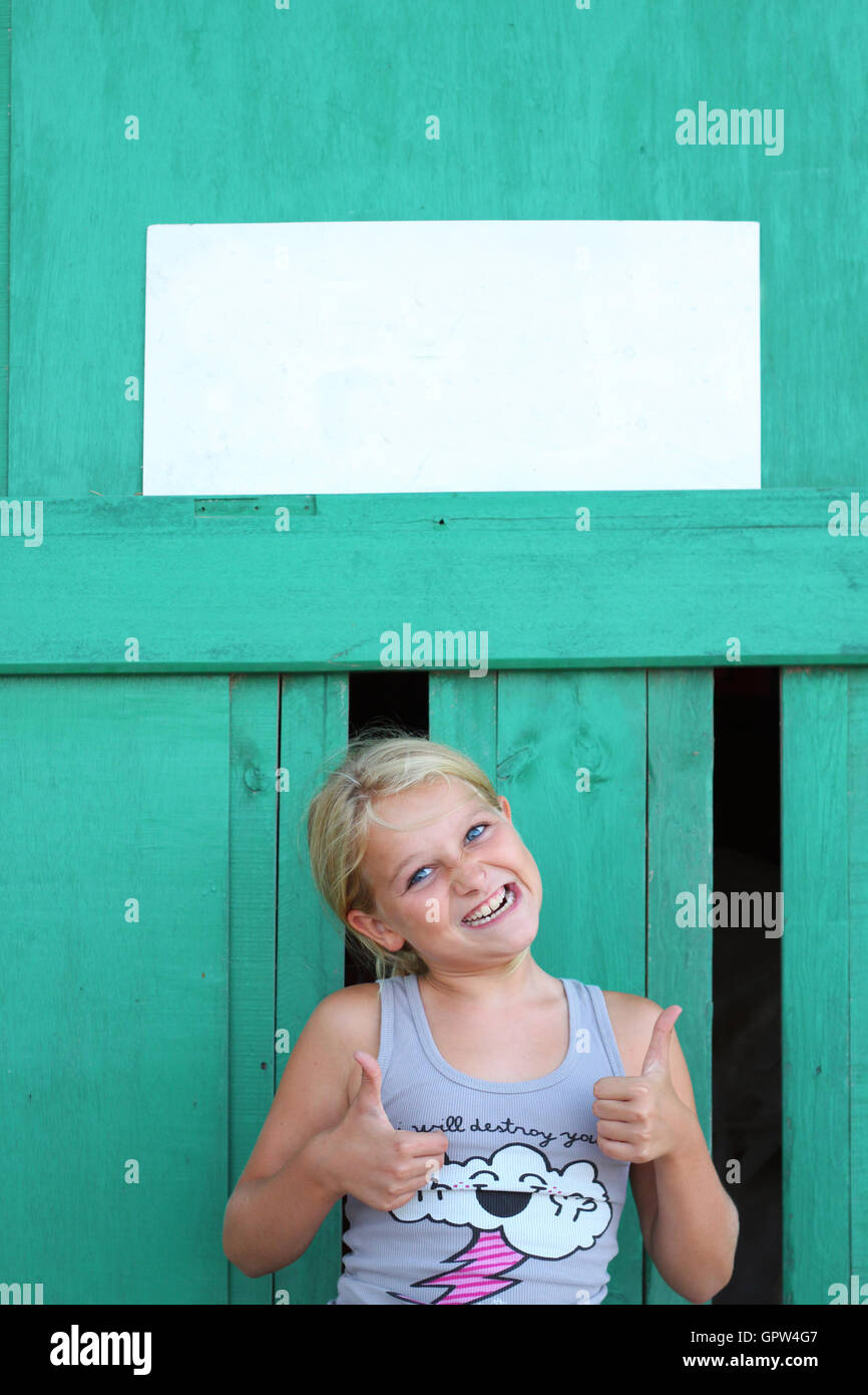 Silly girl with empty sign Stock Photo - Alamy
