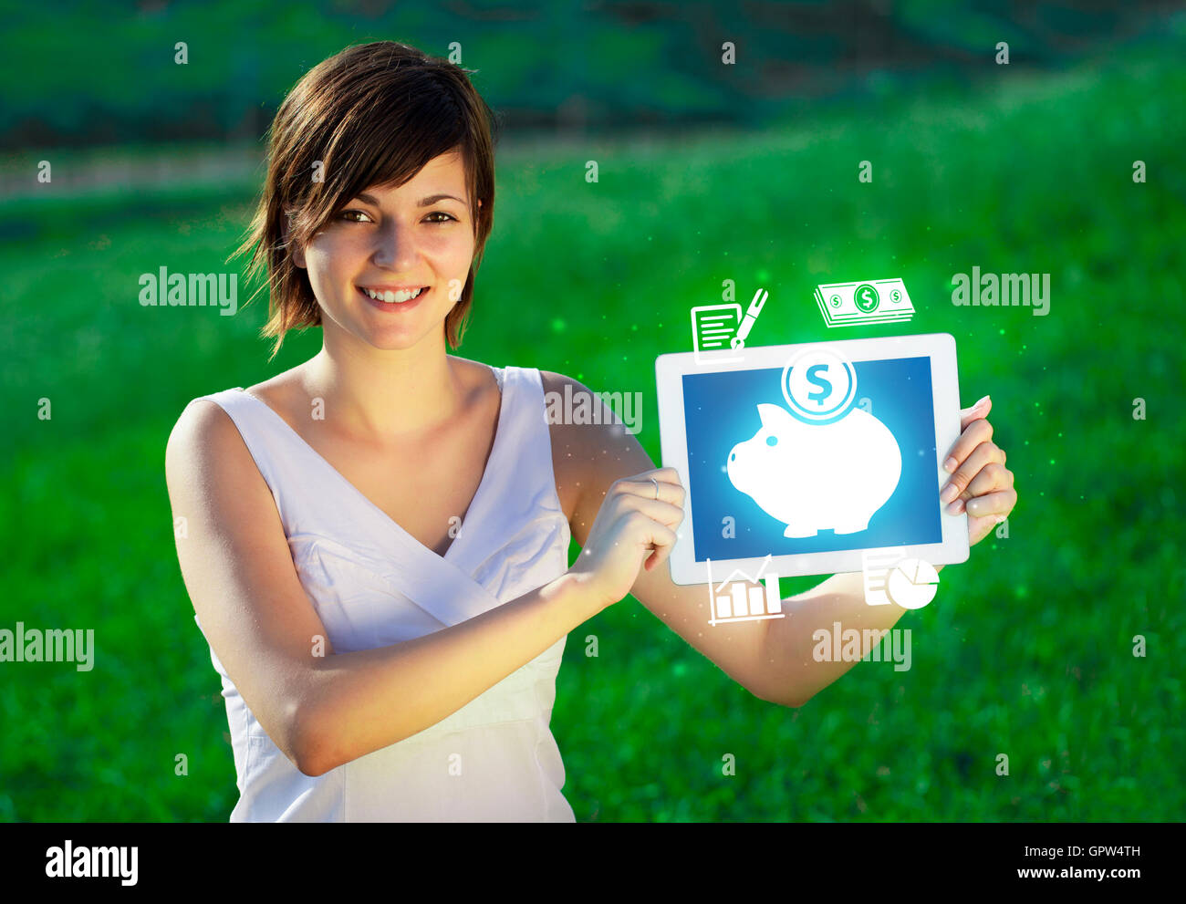 Young woman looking at modern tablet with abstract light and var Stock ...