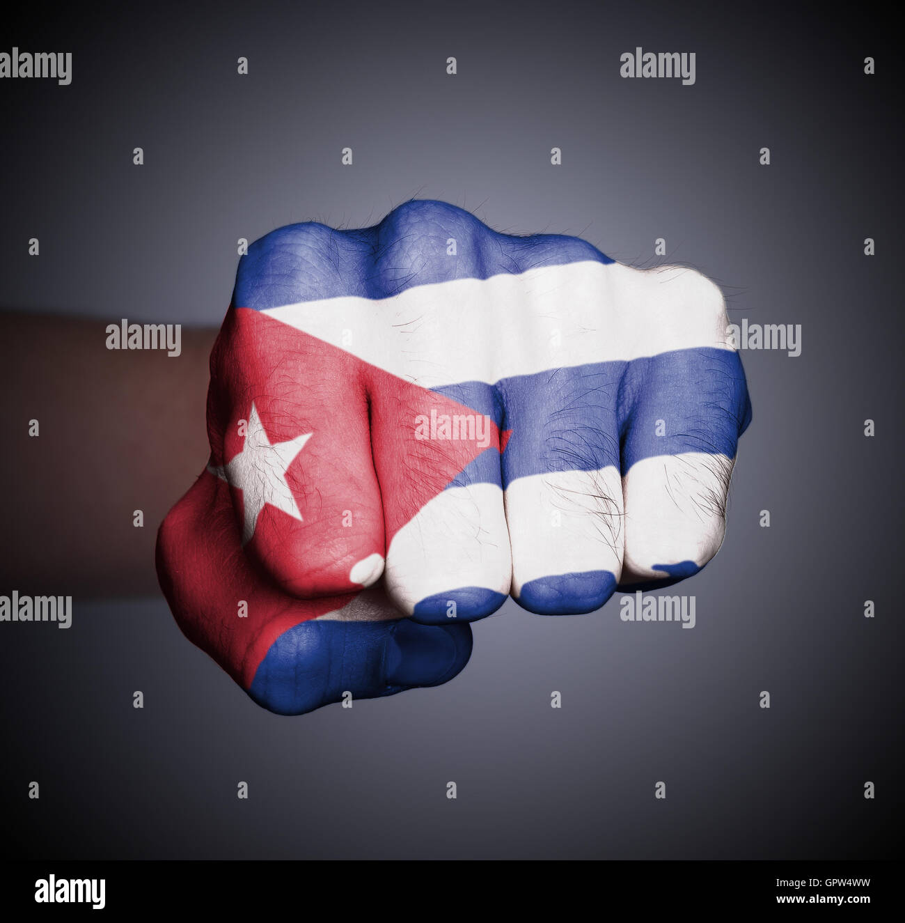 Front view of punching fist on gray background Stock Photo - Alamy